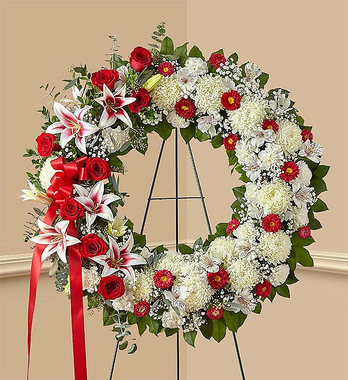 Red Rose and Lily Standing Wreath arranged by a florist in ...